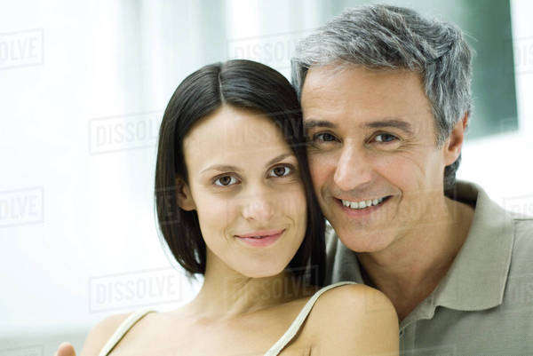 Couple cheek to cheek, smiling at camera, portrait - Royalty-free Stock ...