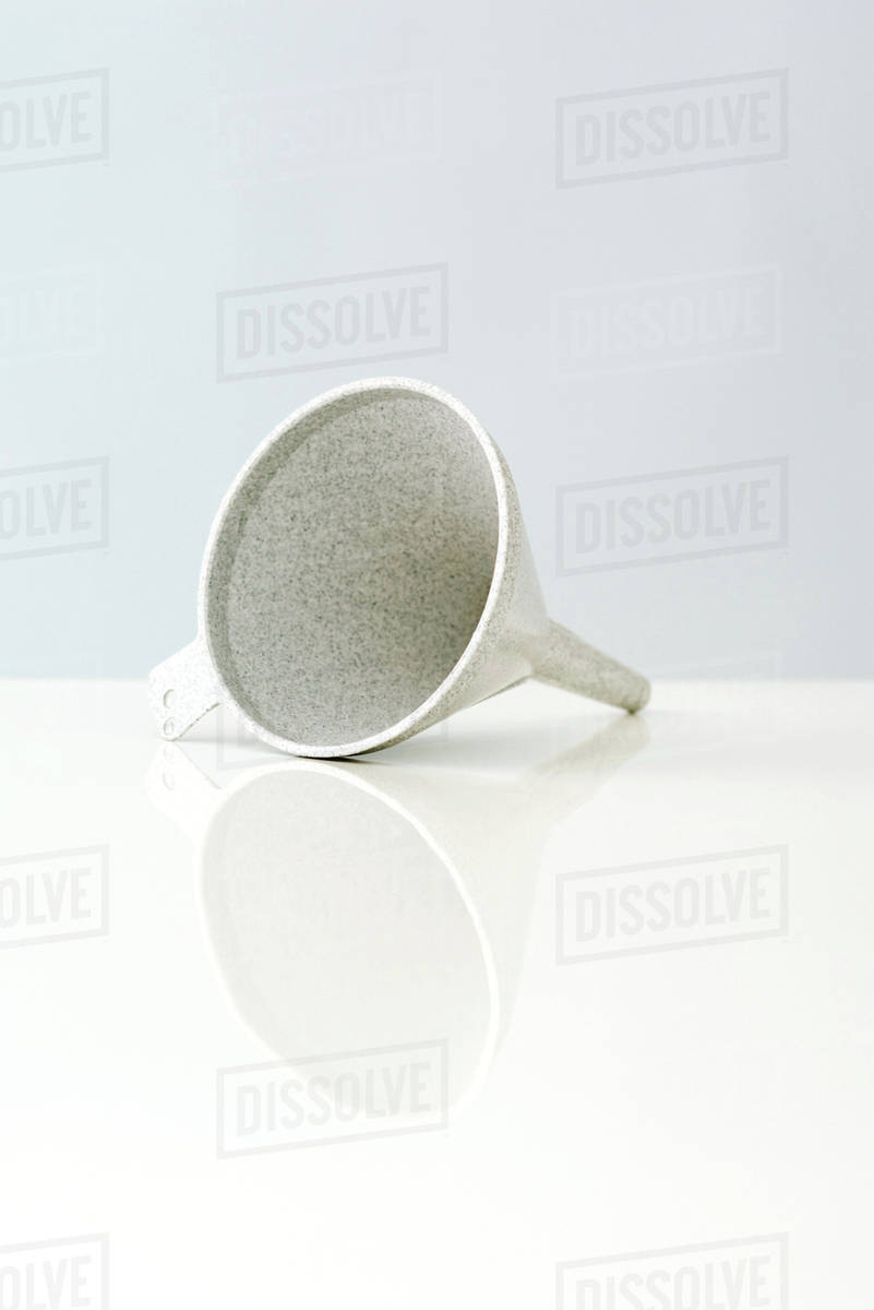 Funnel lying on its side, close-up - Royalty-free Stock Photo | Dissolve