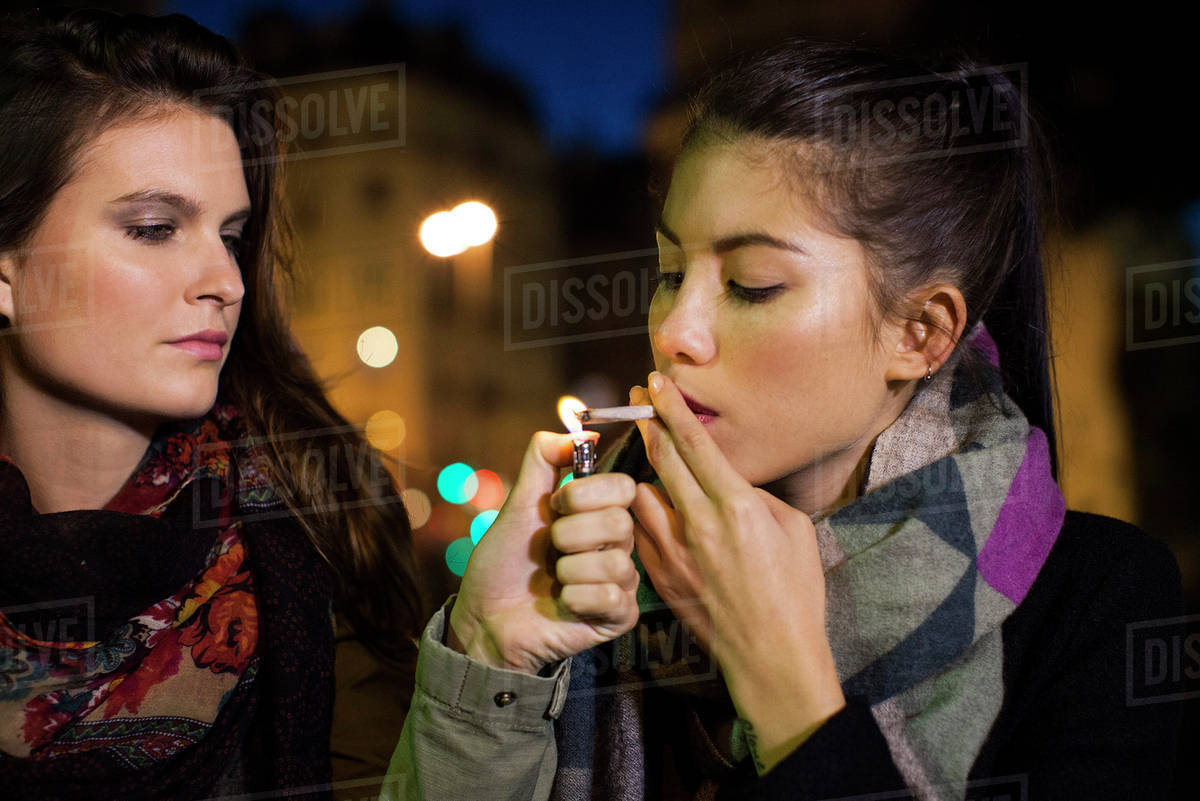 Young women smoking marijuana together - Royalty-free Stock Photo ...