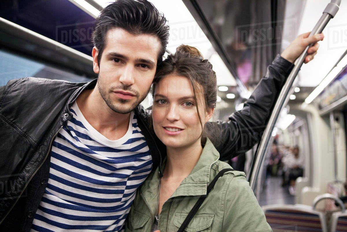 Couple on subway together, portrait - Royalty-free Stock Photo | Dissolve