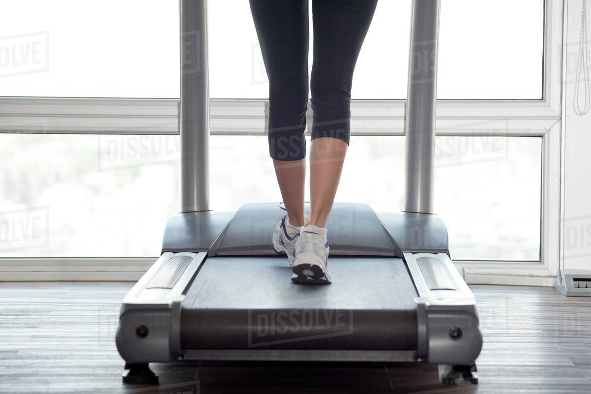 Using treadmill - Stock Photo - Dissolve