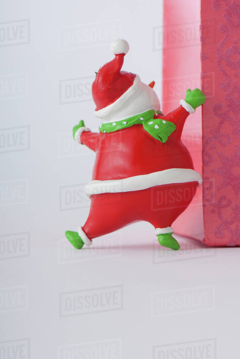 Santa Claus figurine, rear view - Royalty-free Stock Photo | Dissolve