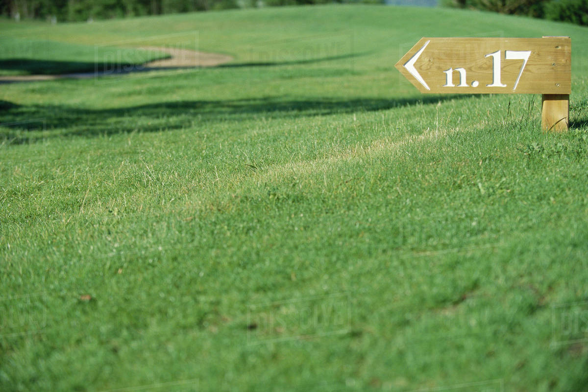 Golf course, sign to number seventeen hole - Royalty-free Stock Photo ...