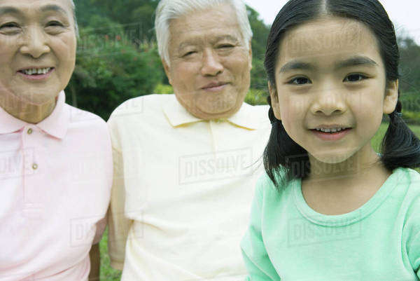 Girl with grandparents, portrait - Stock Photo - Dissolve