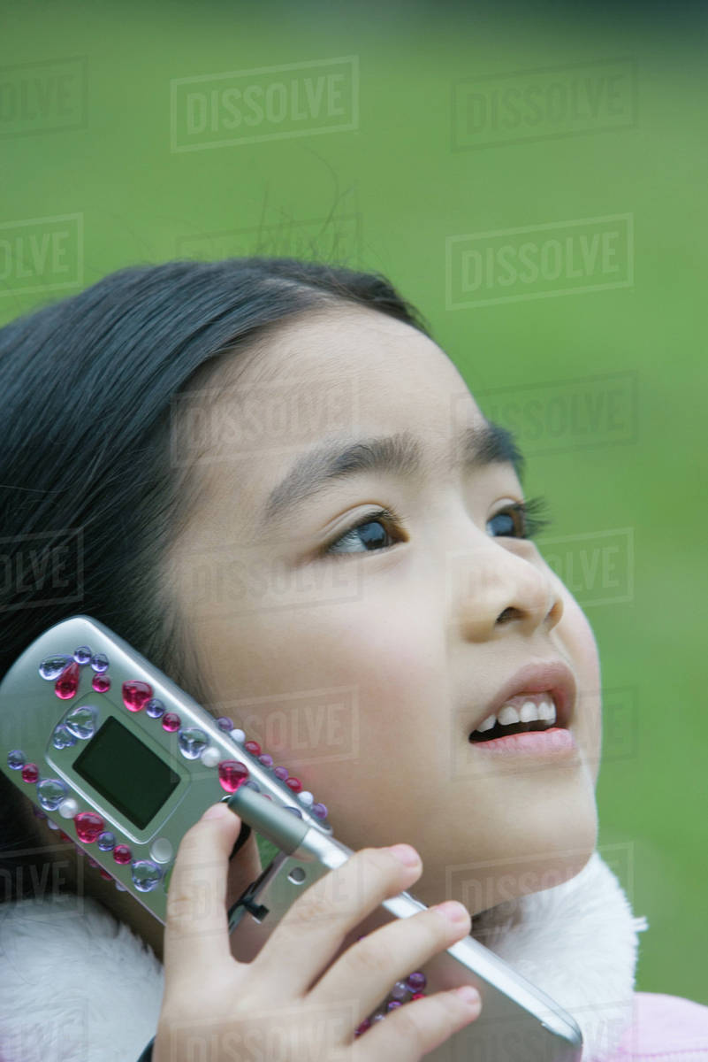 Little girl using cell phone, close-up - Royalty-free Stock Photo ...
