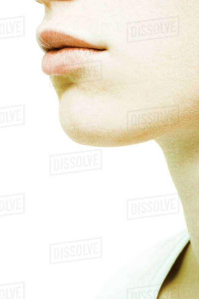 Teen girl's lower face, close-up - Royalty-free Stock Photo | Dissolve