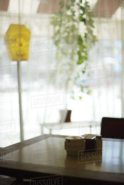 Empty table in restaurant - Royalty-free Stock Photo | Dissolve