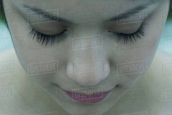 Close-up of young woman's face, eyes closed - Royalty-free Stock Photo ...