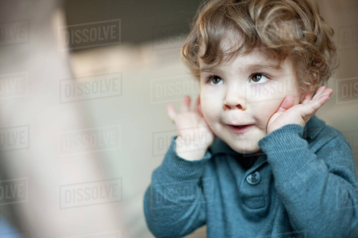 Toddler boy playing and making face, portrait - Royalty-free Stock ...