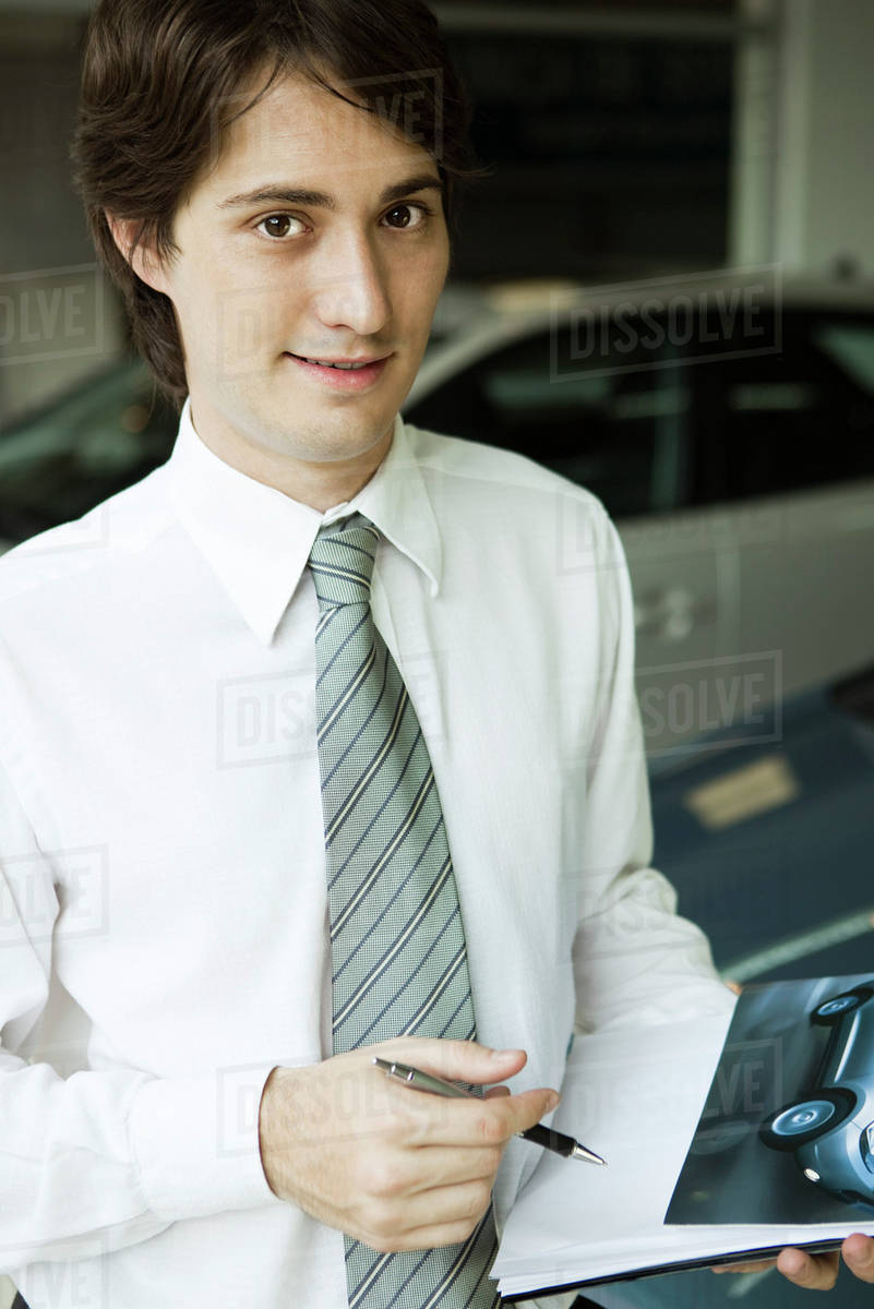 Salesman with brochure - Royalty-free Stock Photo | Dissolve