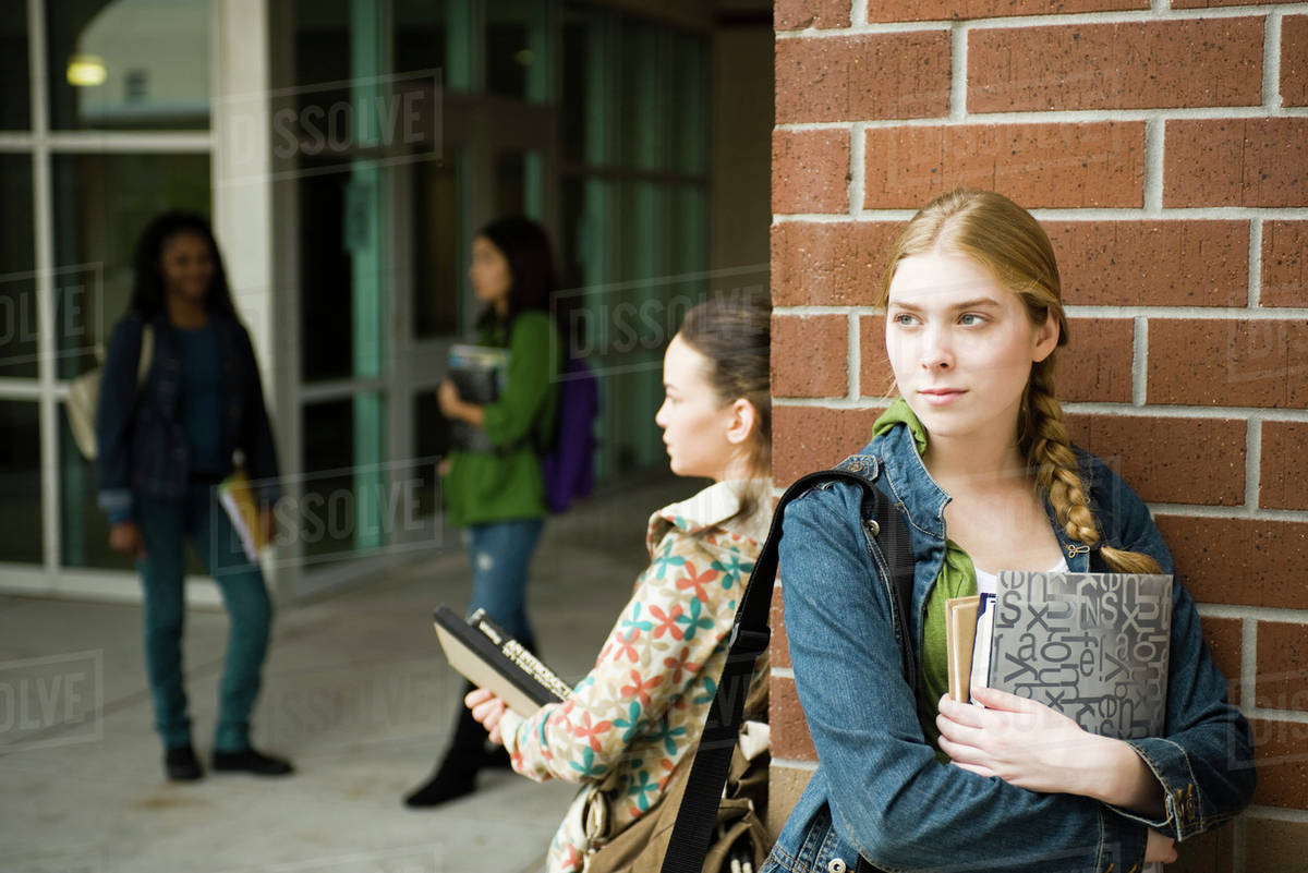 High school students waiting outside school - Royalty-free Stock Photo ...