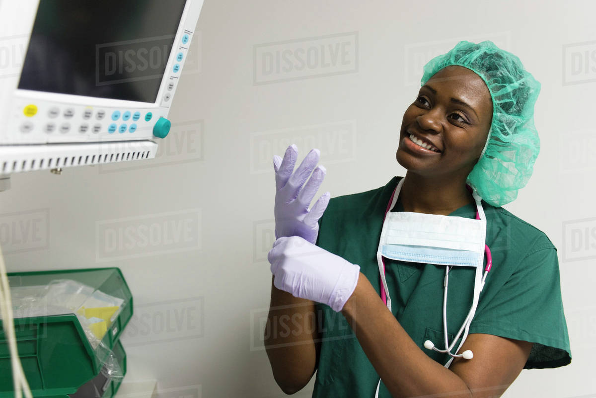 Nurse checking medical equipment monitor - Royalty-free Stock Photo ...