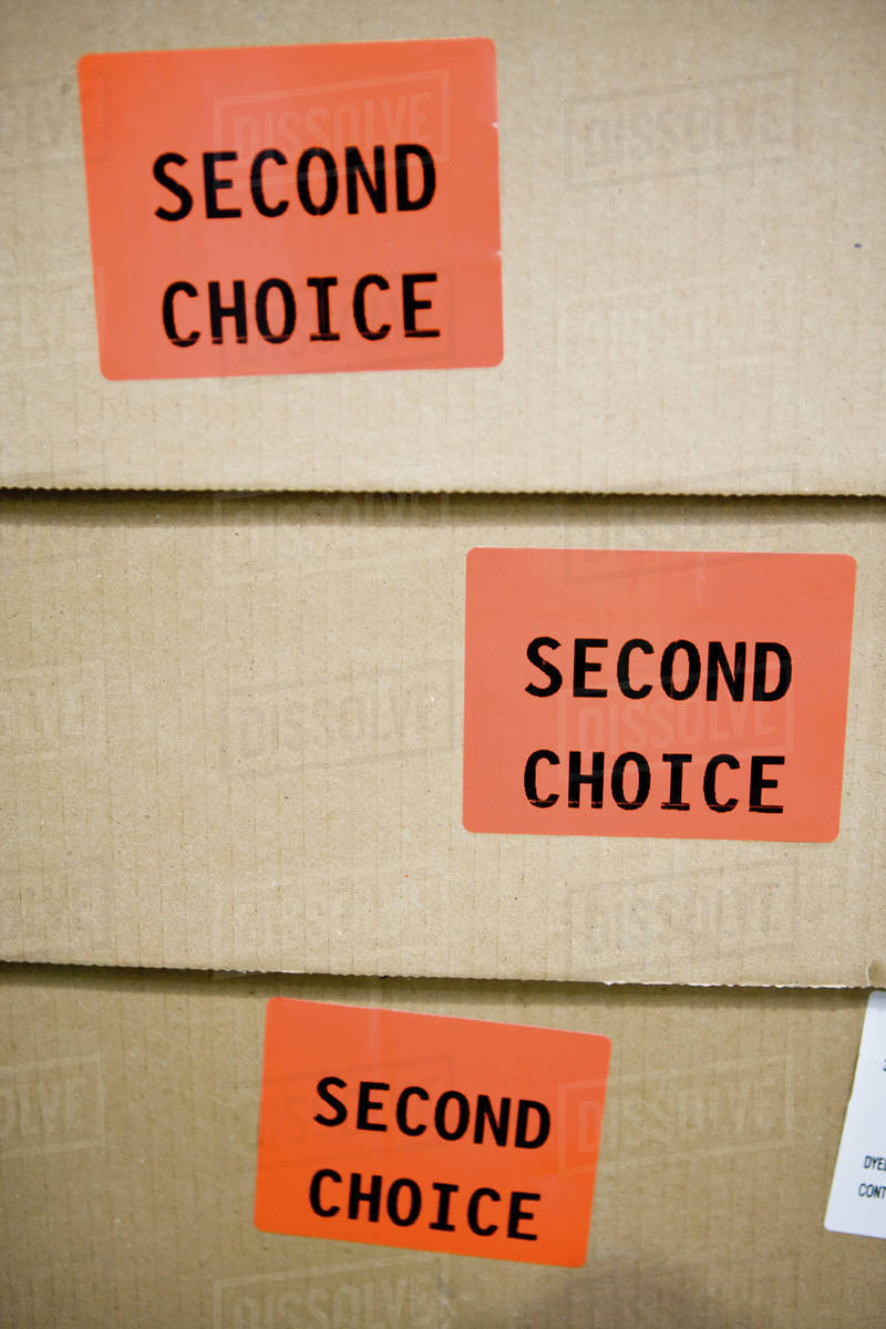 Cardboard boxes labeled with stickers reading "second choice" - Stock ...