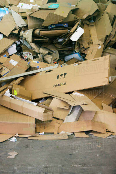 Heap of flattened cardboard boxes - Stock Photo - Dissolve