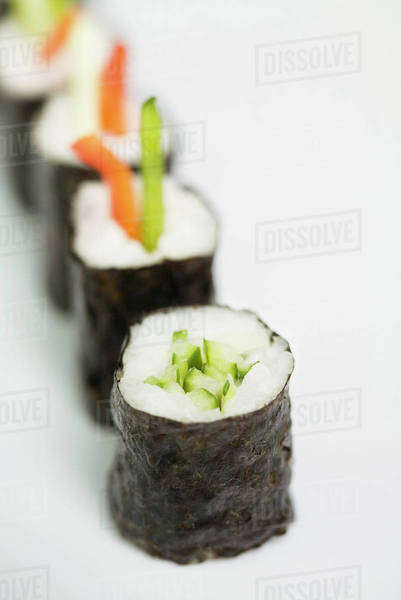 Row of maki sushi, close-up, focus on foreground - Royalty-free Stock ...