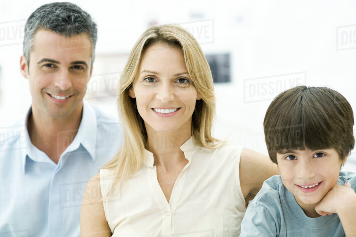 Parents and son smiling at camera, portrait - Royalty-free Stock Photo ...