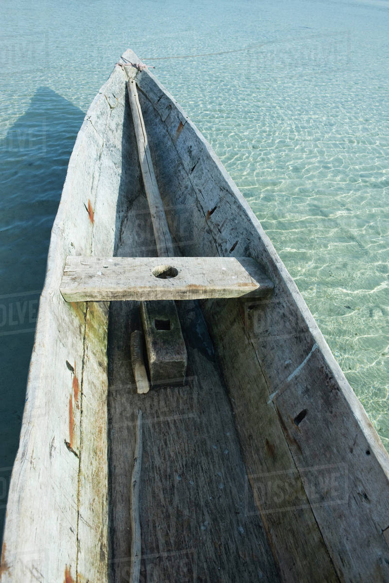 Wooden canoe in shallow water, cropped - Royalty-free Stock Photo ...