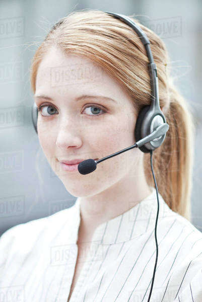 Operator wearing phone headset - Royalty-free Stock Photo | Dissolve