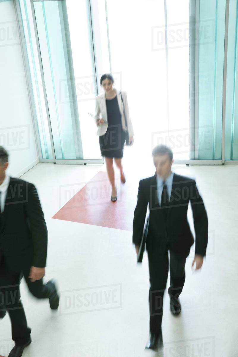 Business professionals arriving for another day of work - Royalty-free ...