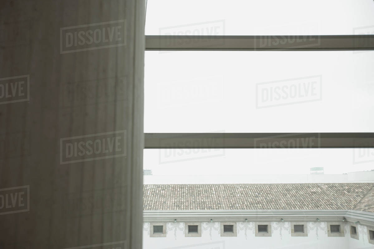 Architectural view of column and courtyard - Stock Photo - Dissolve
