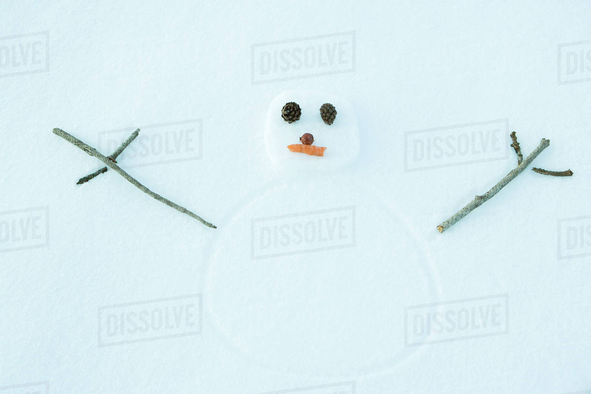 Snowman drawn on ground, portrait, high angle view - Stock Photo - Dissolve