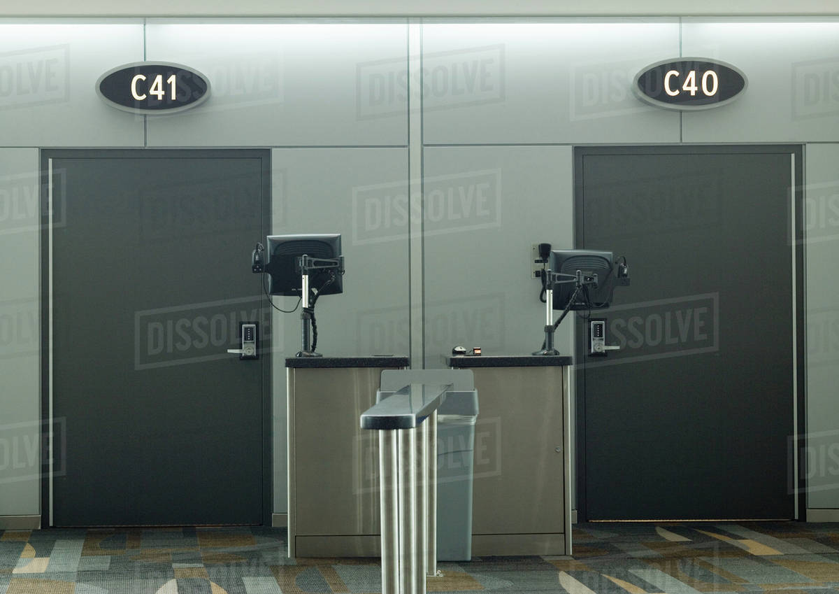Two departure gate doors - Stock Photo - Dissolve