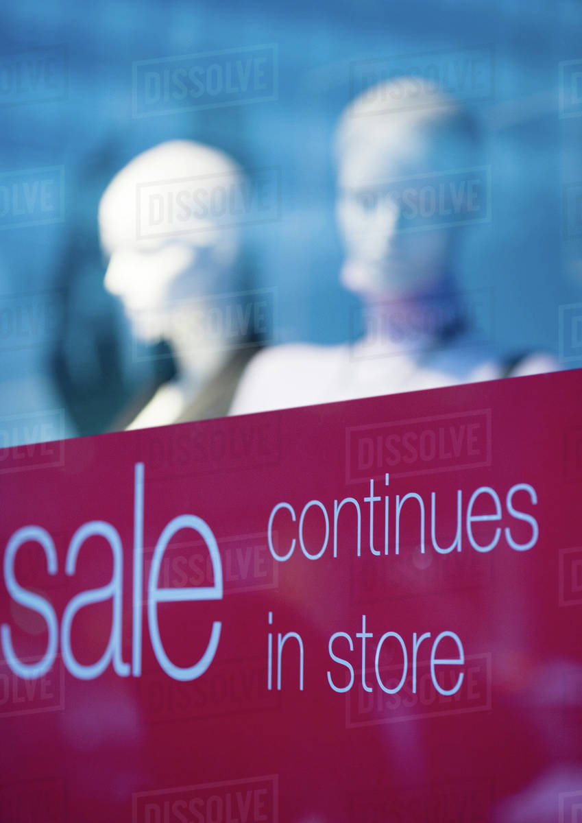 Shop window with sign saying "sale continues in store" - Stock Photo ...