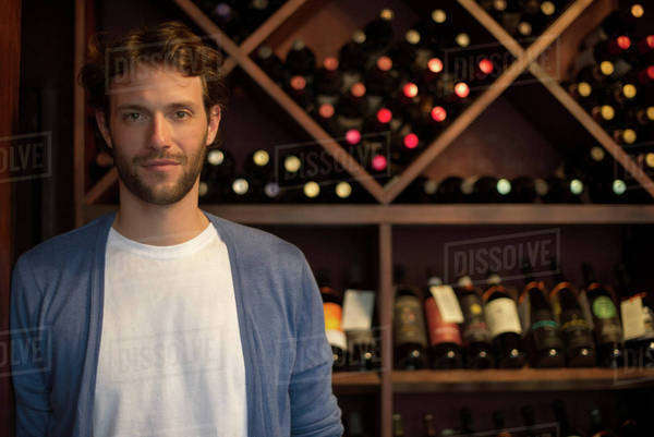 Sommelier in wine cellar, portrait - Royalty-free Stock Photo | Dissolve