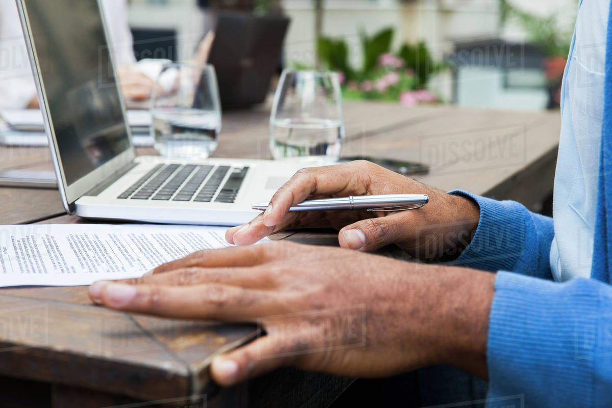 Man reviewing document - Royalty-free Stock Photo | Dissolve