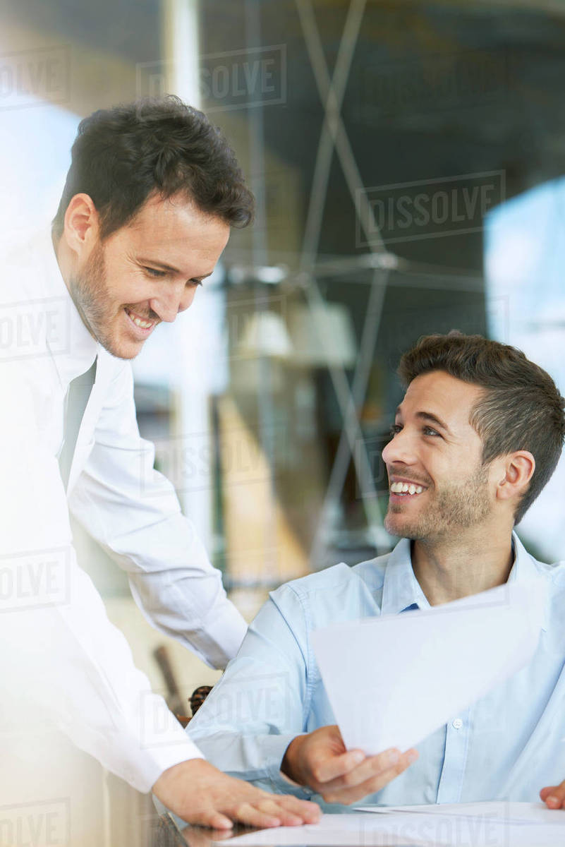 Business professionals collaborating - Stock Photo - Dissolve