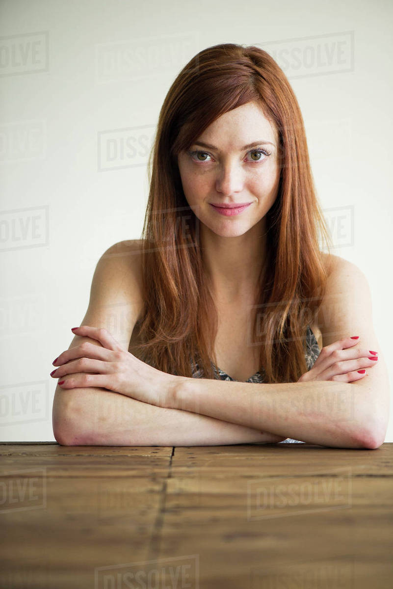 Woman with arms folded - Royalty-free Stock Photo | Dissolve