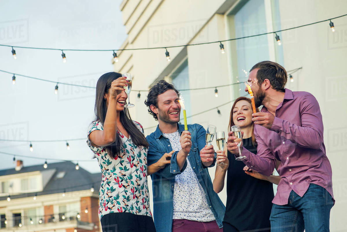 Friends drinking champagne together outdoors - Royalty-free Stock Photo ...