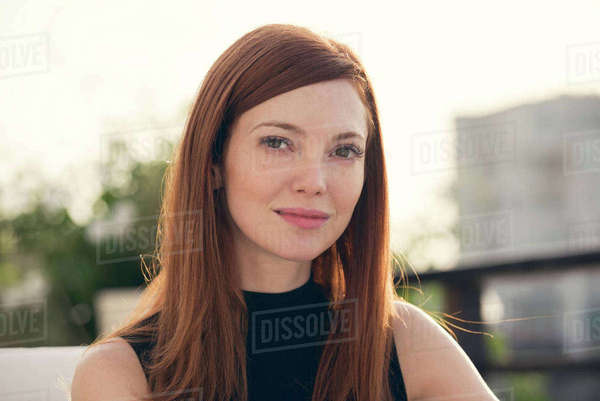 Mid adult woman, portrait - Royalty-free Stock Photo | Dissolve