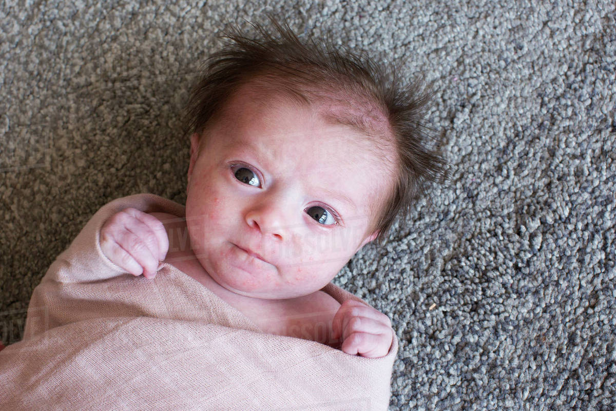 New born baby wrapped in towel - Royalty-free Stock Photo | Dissolve