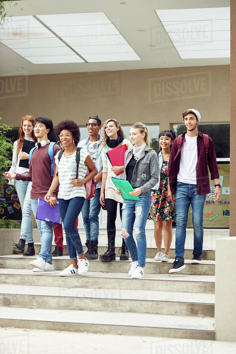 College students walking on campus between classes - Royalty-free Stock ...