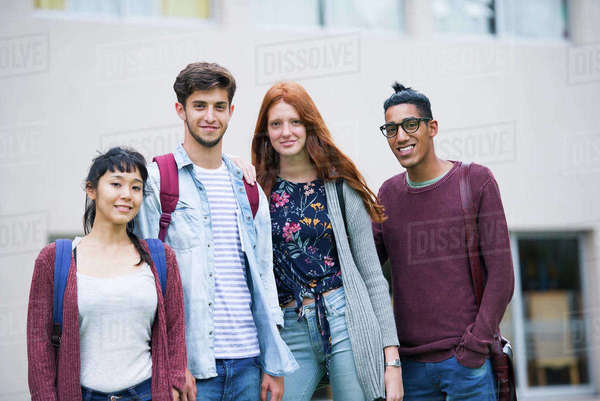 College students standing together outdoors, portrait - Stock Photo ...