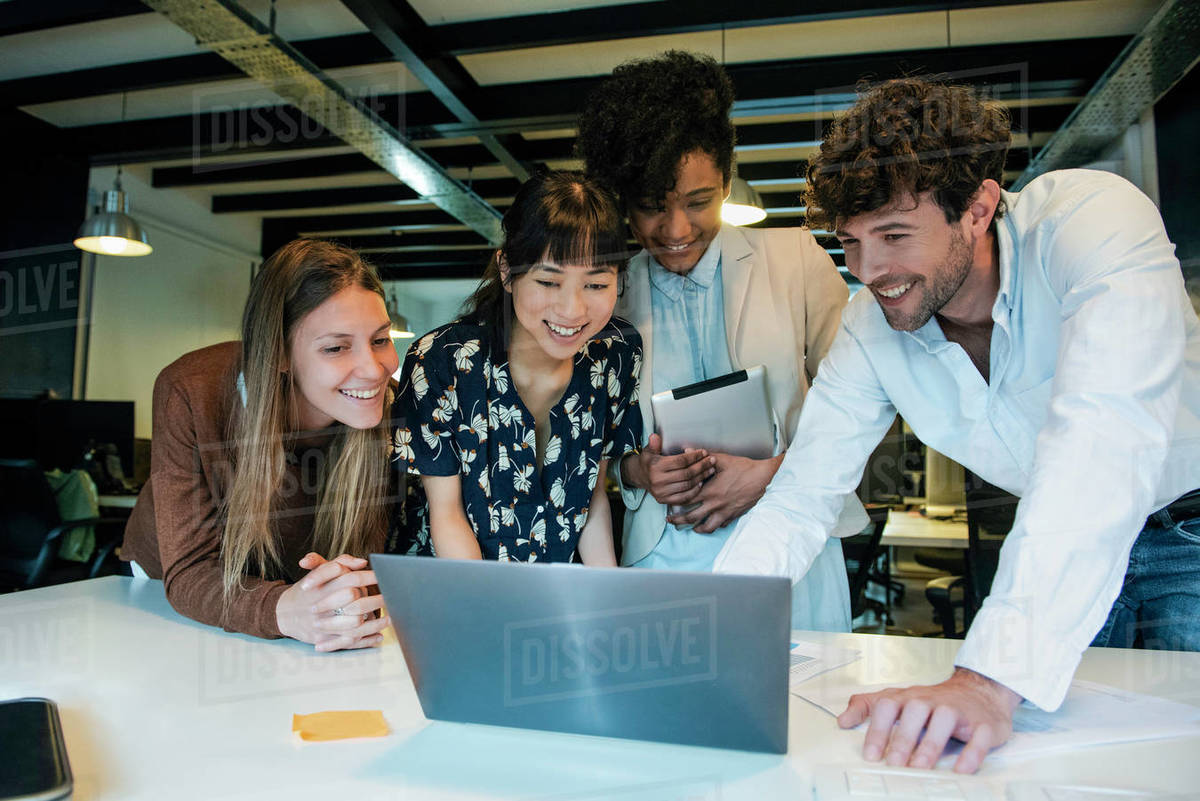 Business people using laptop in office - Royalty-free Stock Photo ...