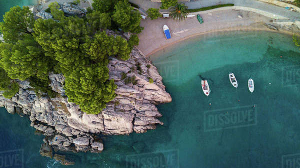 Aerial view of coastline and boats - Stock Photo - Dissolve