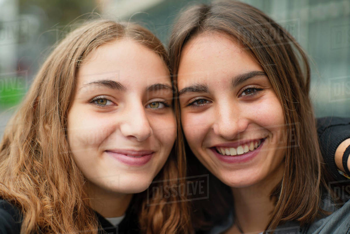 Close-up of smiling friends - Royalty-free Stock Photo | Dissolve