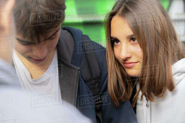 Close-up of girl looking at her friend - Stock Photo - Dissolve