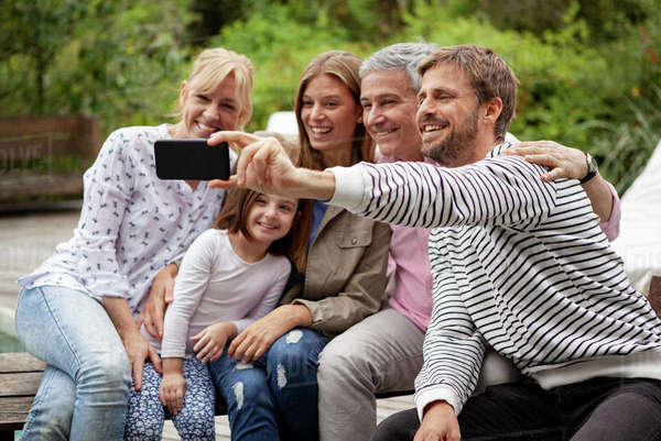 Family taking selfie - Royalty-free Stock Photo | Dissolve