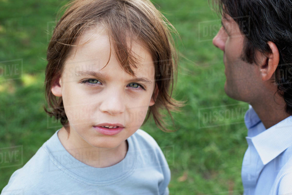 Boy staring at camera - Royalty-free Stock Photo | Dissolve