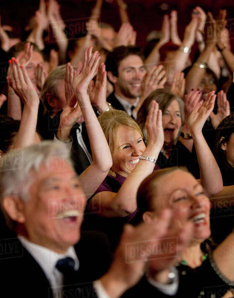 Audience clapping in theater - Royalty-free Stock Photo | Dissolve