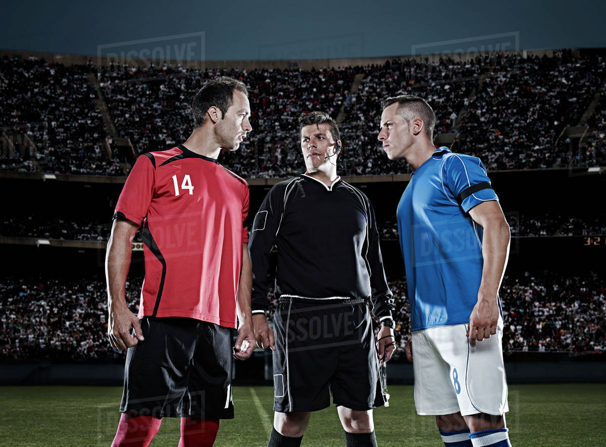 Soccer players facing each other on field - Royalty-free Stock Photo ...