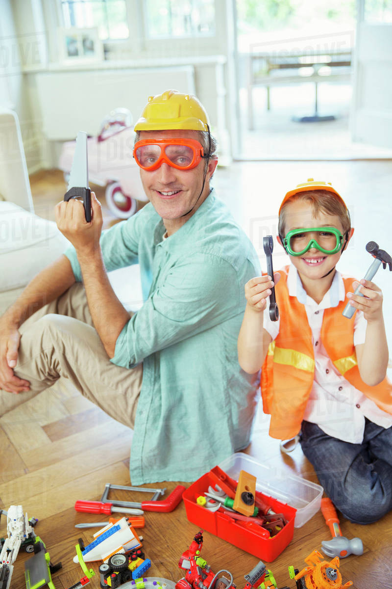Father and son playing with construction toys - Royalty-free Stock ...