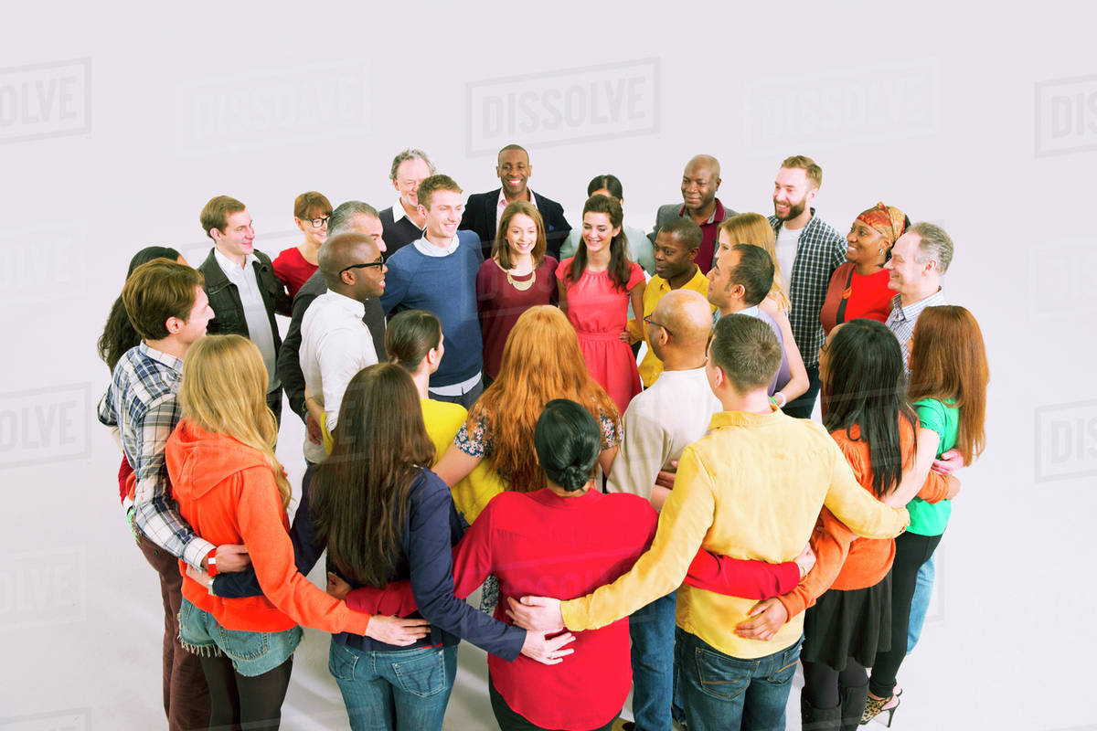 Business people in huddle - Royalty-free Stock Photo | Dissolve