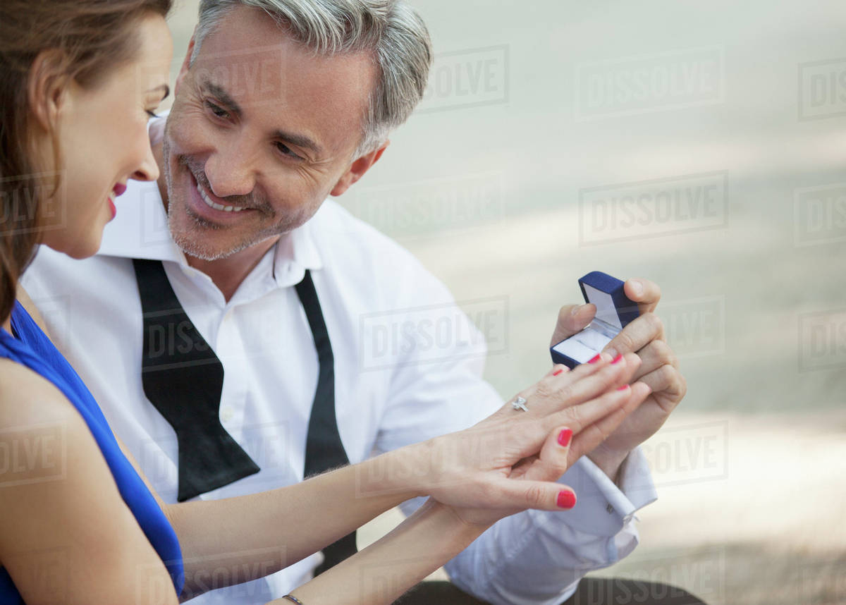 Man with engagement ring proposing to woman - Royalty-free Stock Photo ...