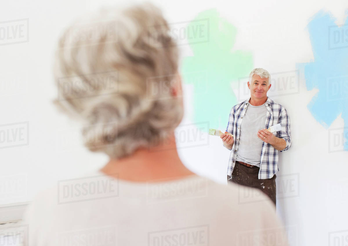 Older couple deciding on paint colors together - Royalty-free Stock ...