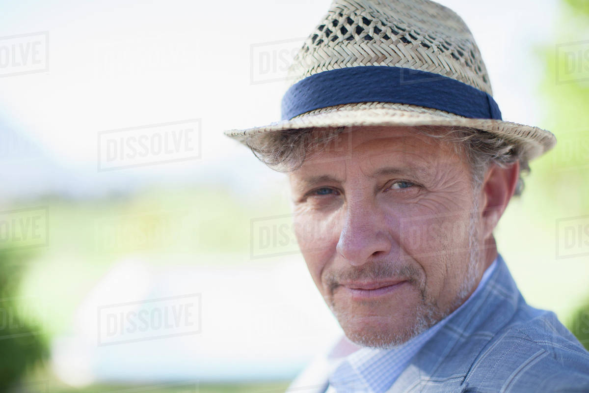 Older man smiling outdoors - Royalty-free Stock Photo | Dissolve