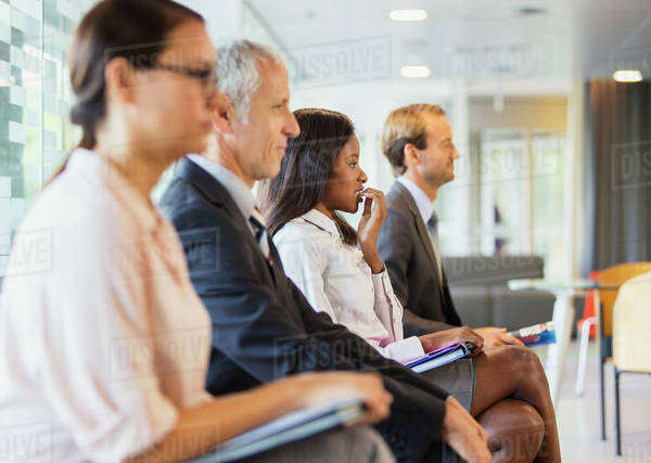 Business people sitting in office together - Royalty-free Stock Photo ...